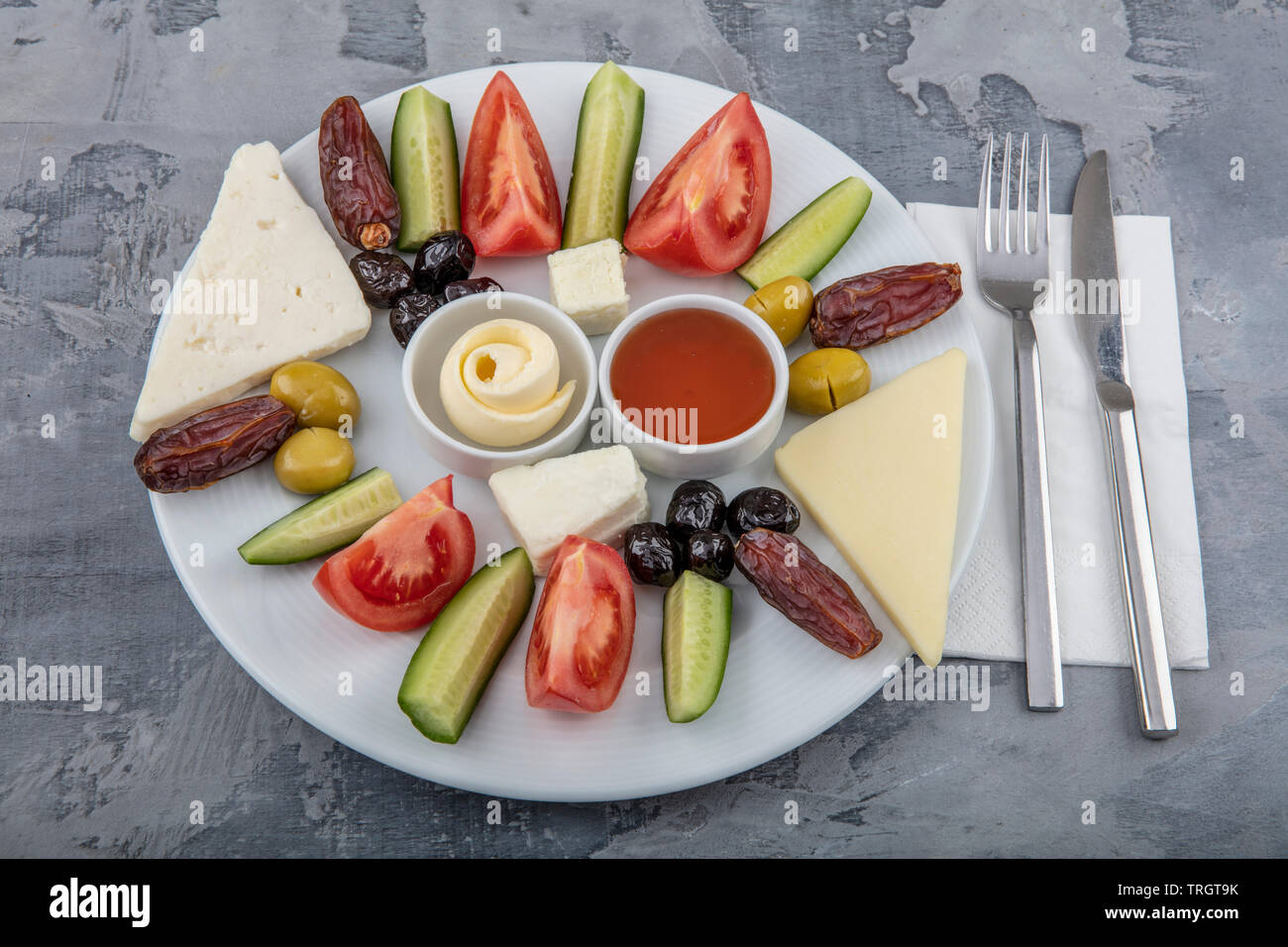 Traditional Ramadan (iftar) foods in ceramic plate.Three different ...