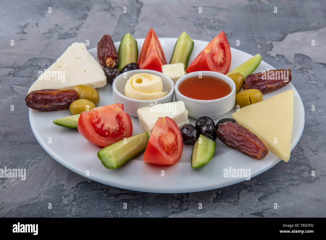 Traditional Ramadan (iftar) foods in ceramic plate.Three different ...
