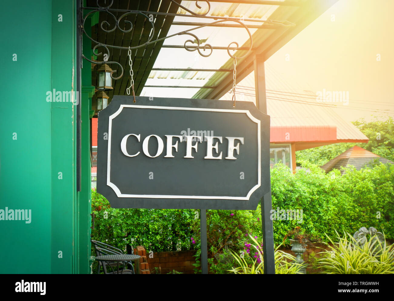 coffee sign hang in front of the coffee shop Stock Photo - Alamy