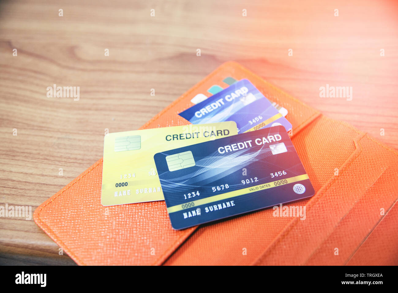 credit card in wallet on the wooden table background Stock Photo - Alamy
