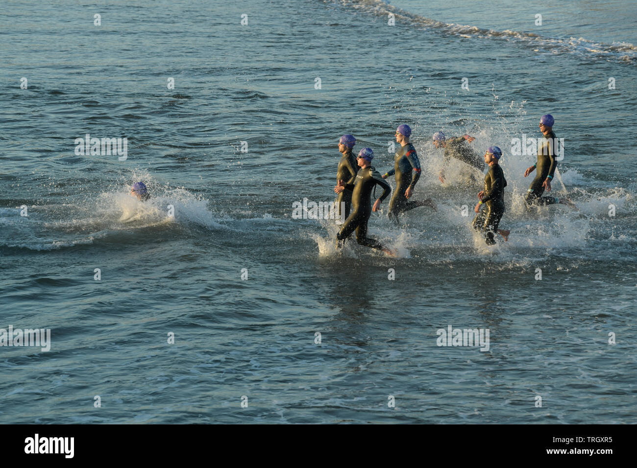 Durban, KwaZulu-Natal, South Africa, group triathlon athletes running ...