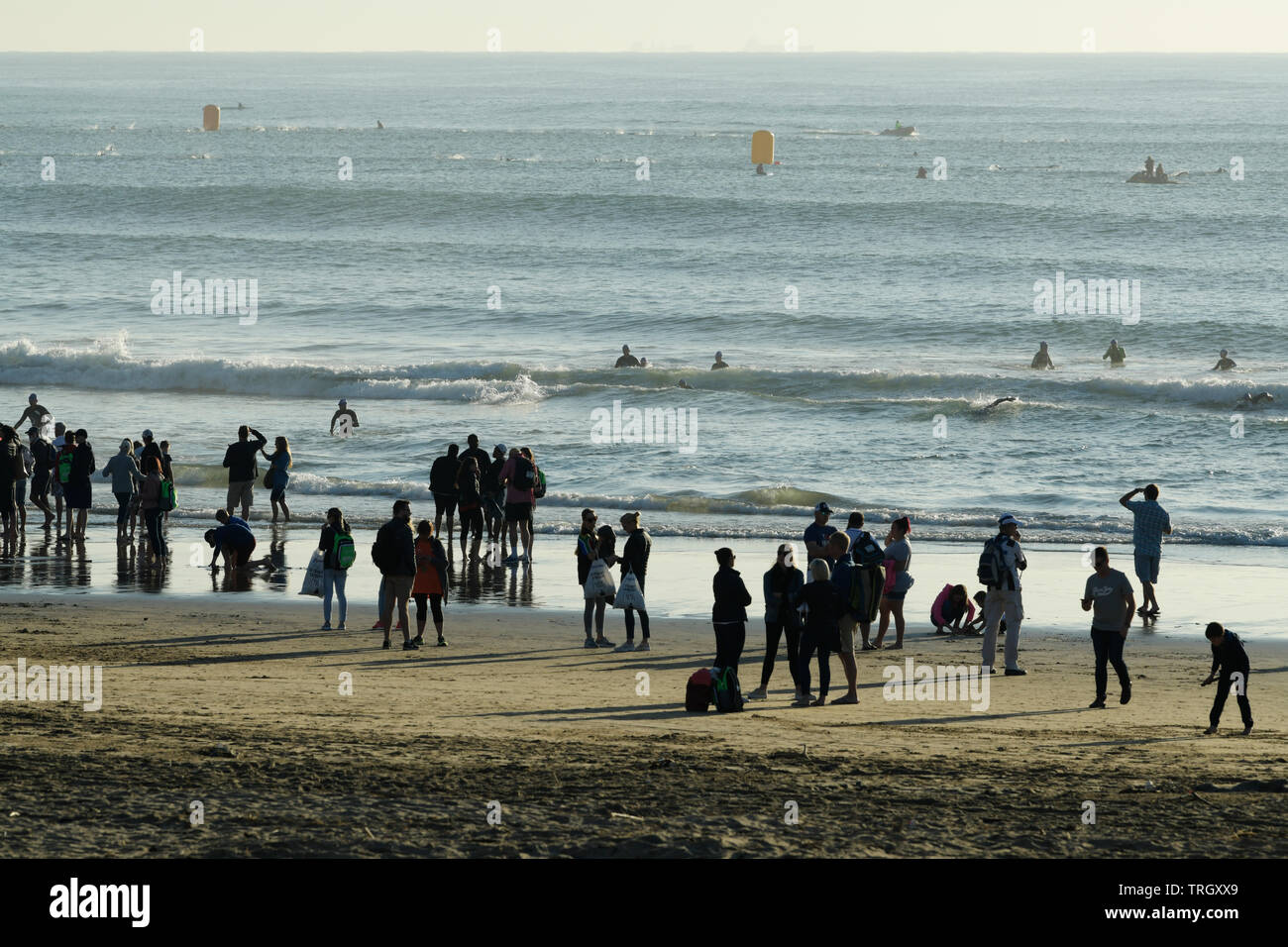 Durban, South Africa, crowd of people standing on beach watching ...