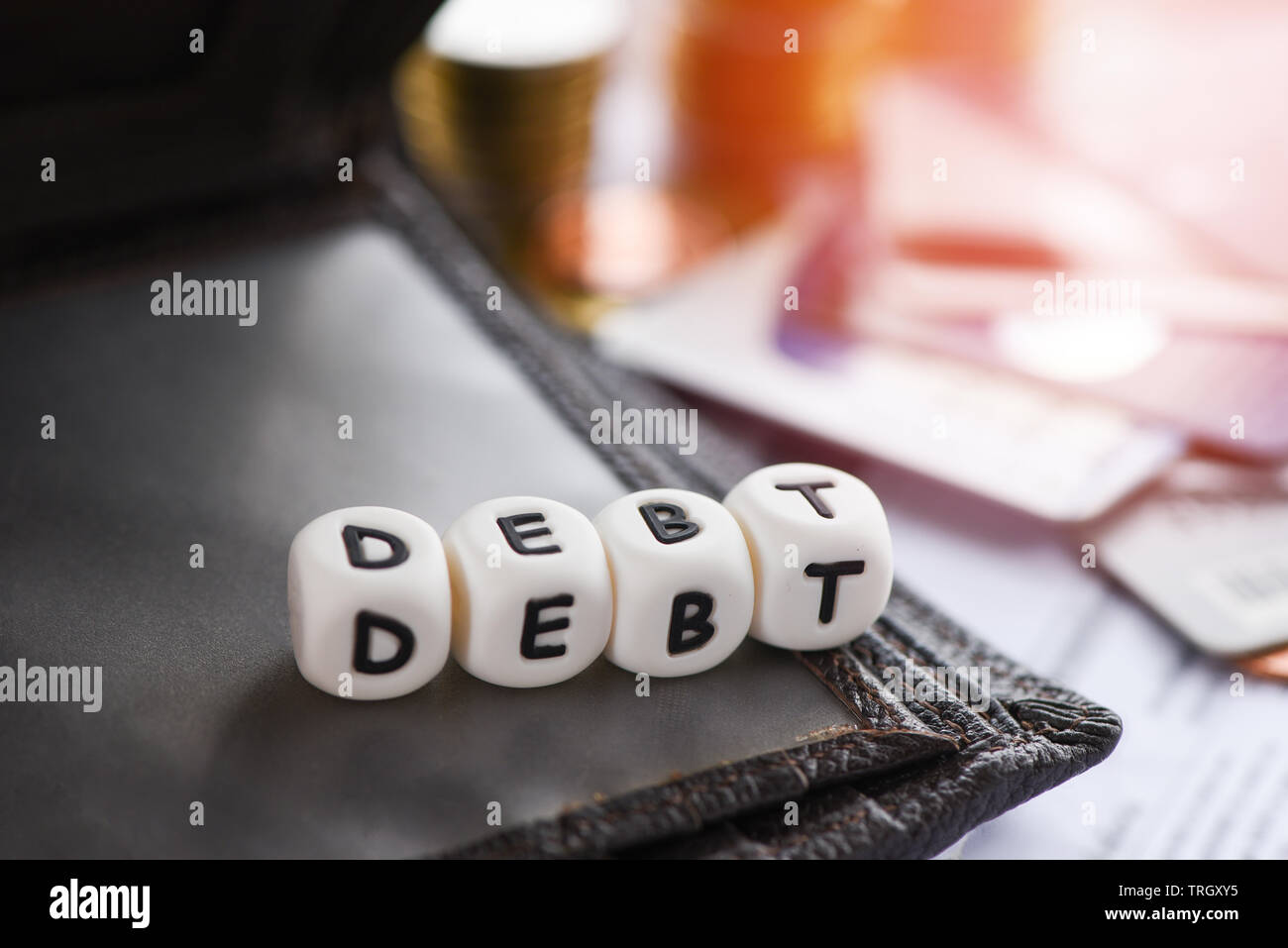 Debt credit card and money coin stack / Increased liabilities from ...