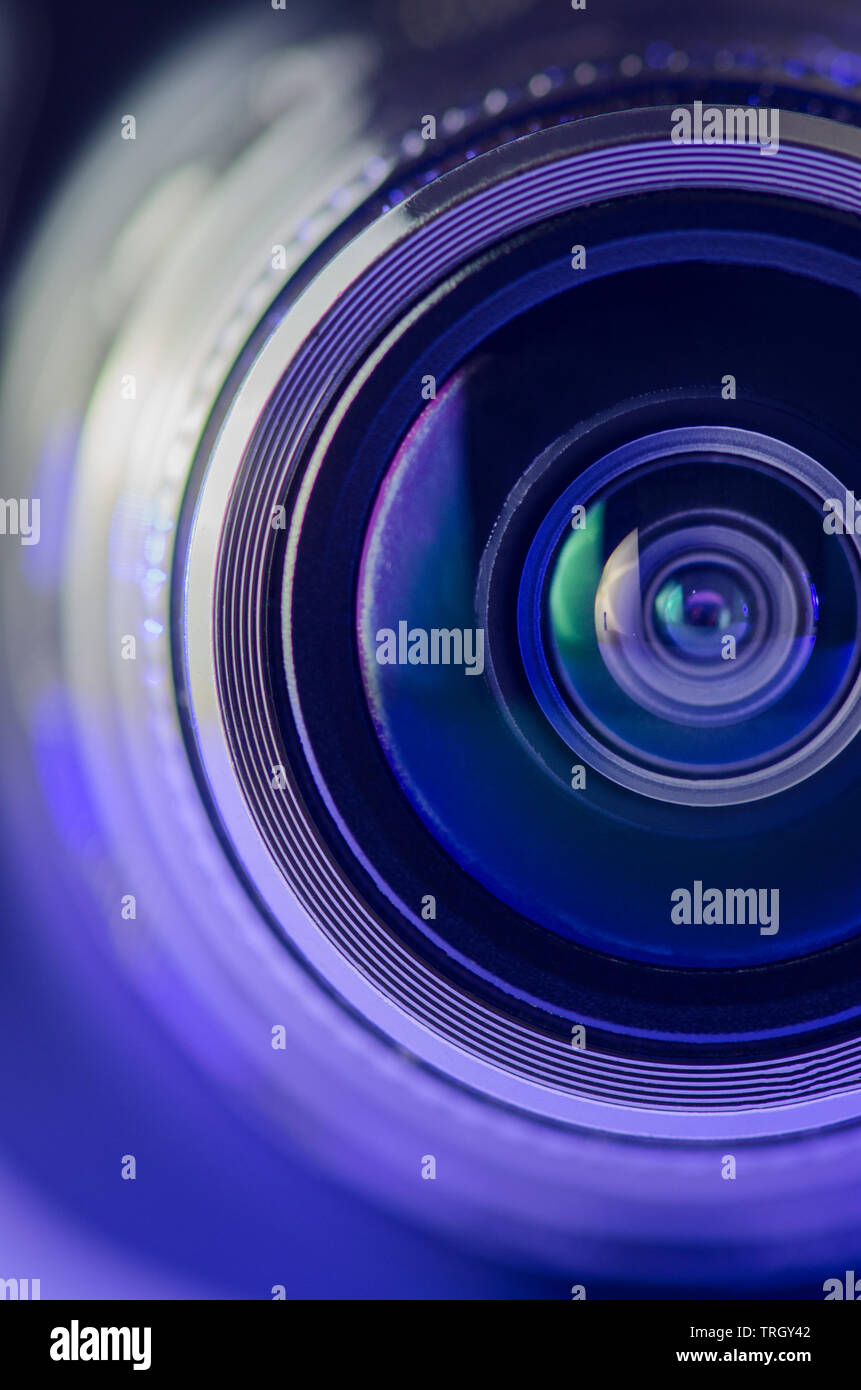 The camera lens and the beautiful light blue. Vertical photo Stock ...