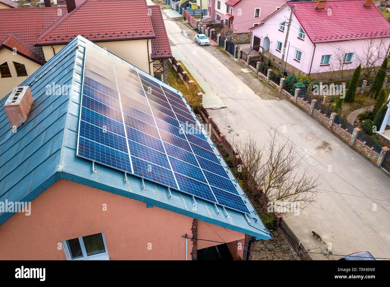 Close-up surface of lit by sun blue shiny solar photo voltaic panels ...
