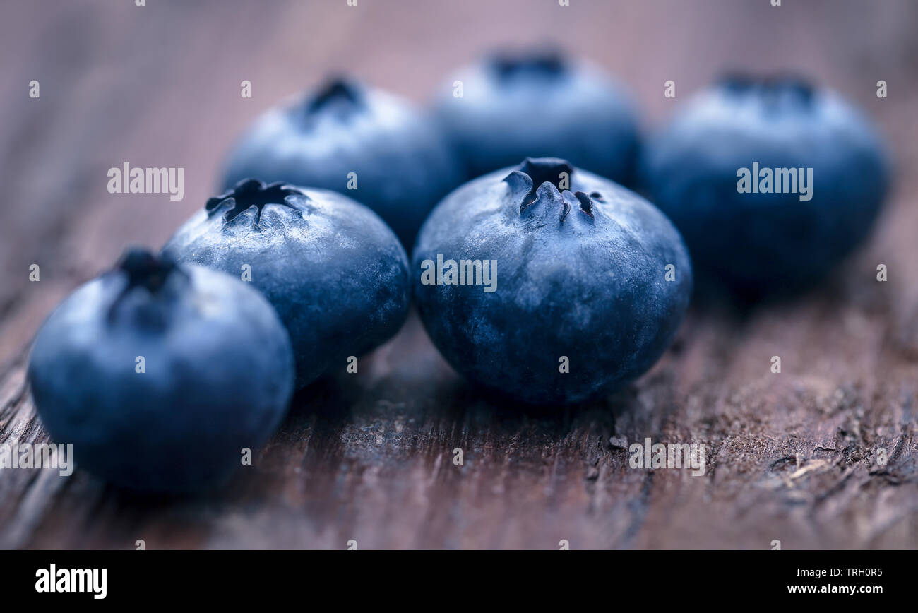 Group of fresh blueberries on natural surface Stock Photo - Alamy