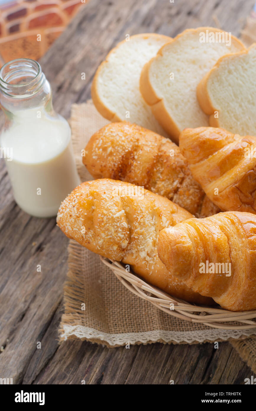 Bread .Composition with wicker basket and different bread Stock Photo ...
