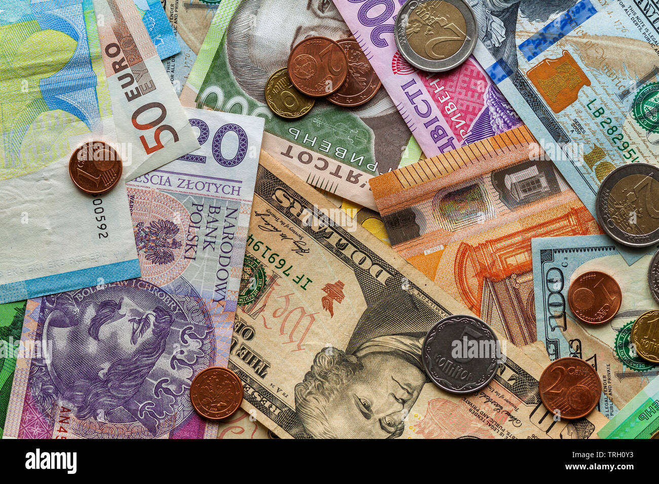 Colorful abstract background made of different metal coins, American ...