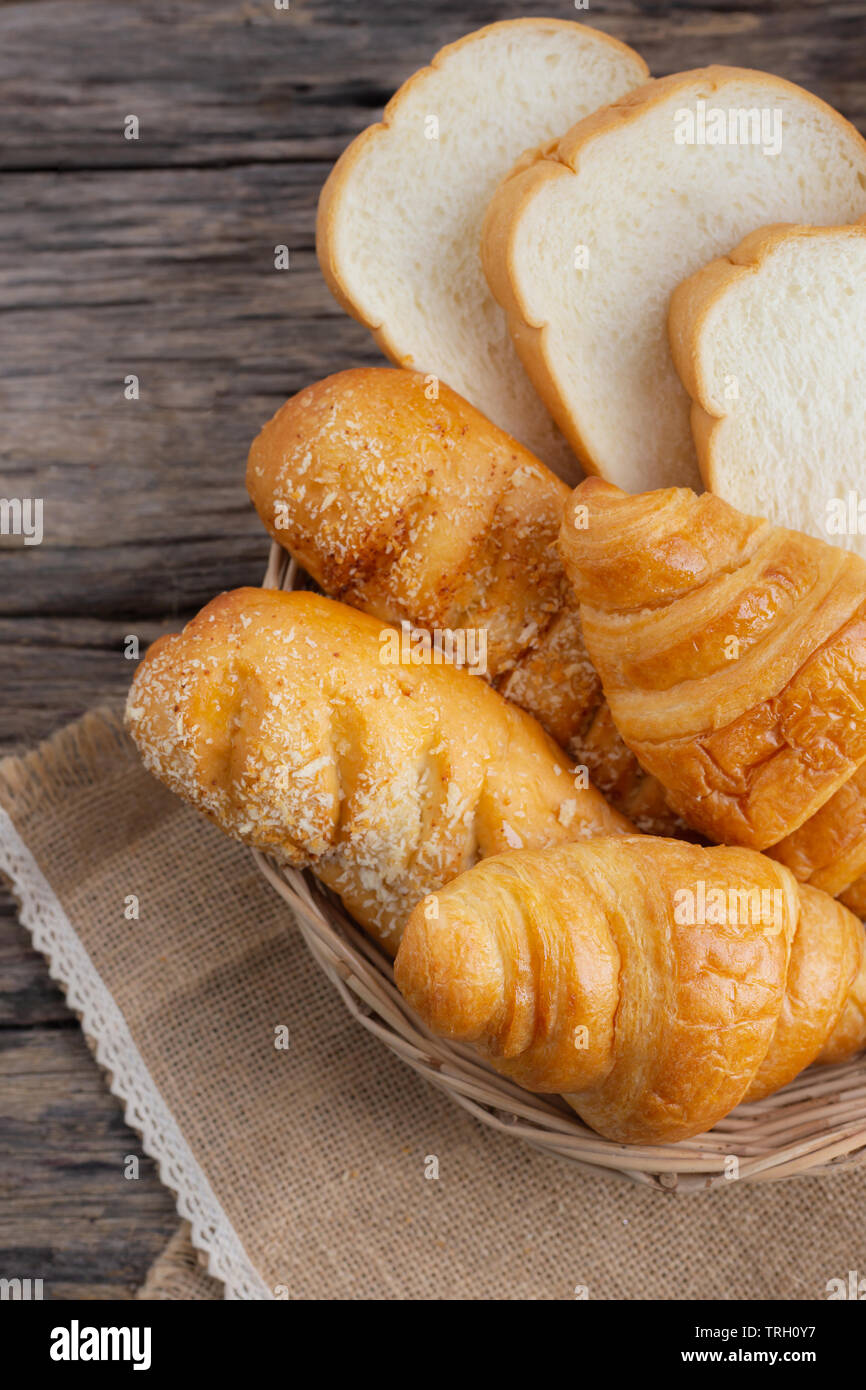 Bread .Composition with wicker basket and different bread Stock Photo ...
