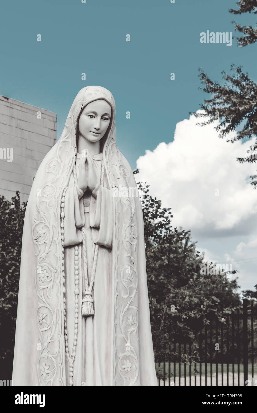 Detroit, USA - October 2nd, 2016: A Statue of Mary in the garden at the ...
