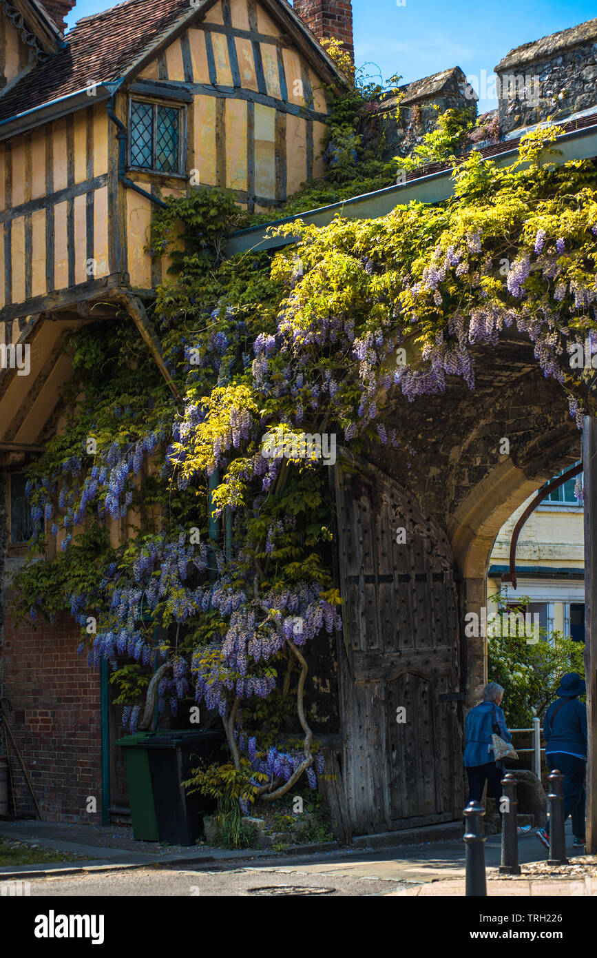 Tudor timber framed building next to The Priory Gate, Cathedral Close ...