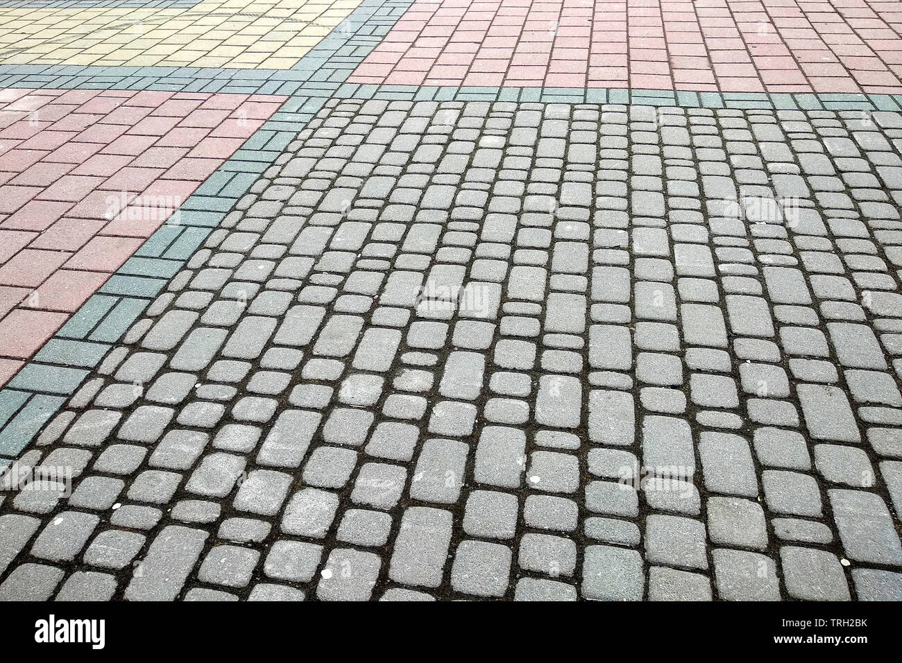 Stone pavement in perspective. Granite cobblestone pavement tiles Stock ...