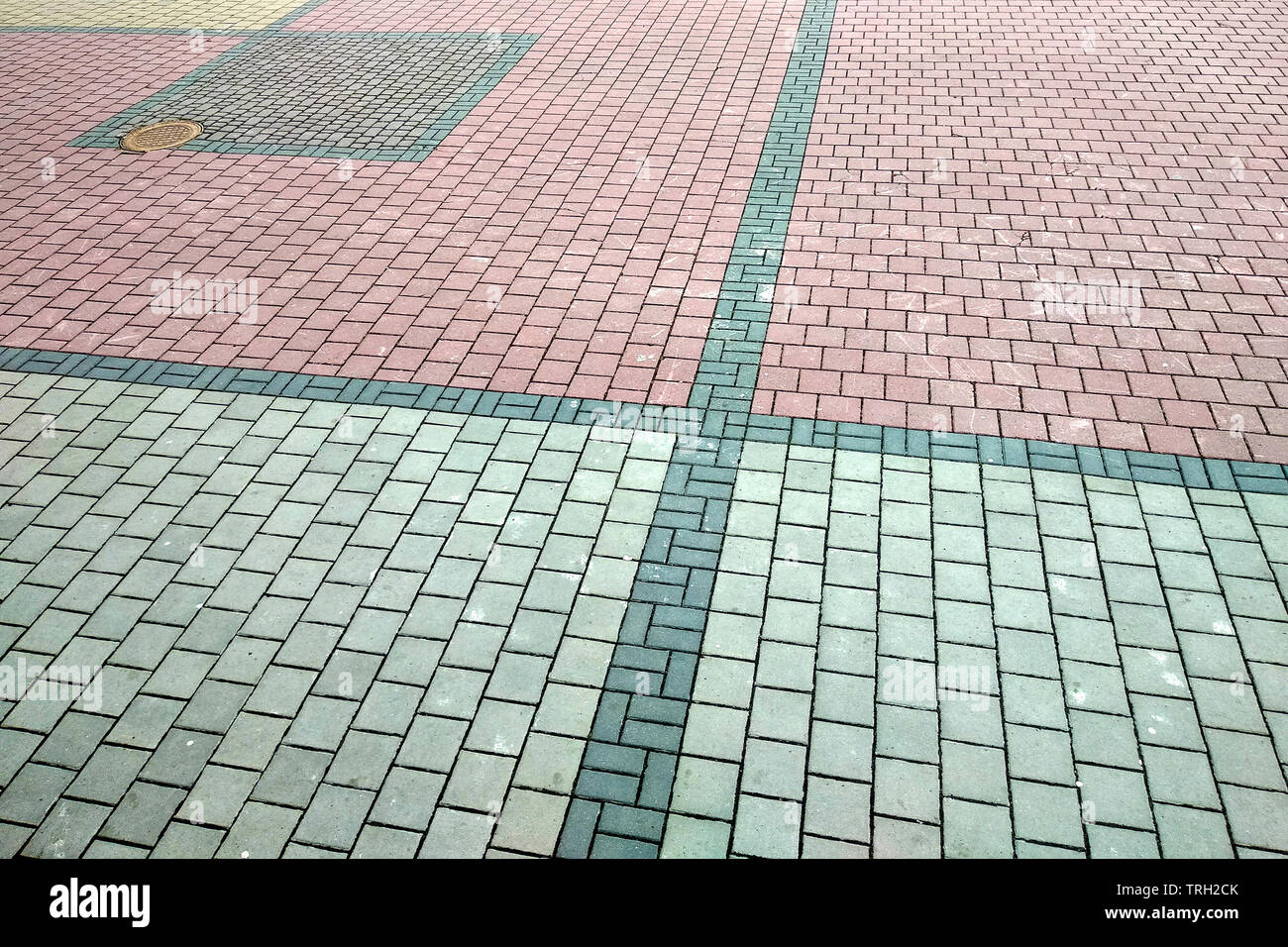 Stone pavement in perspective. Granite cobblestone pavement tiles Stock ...