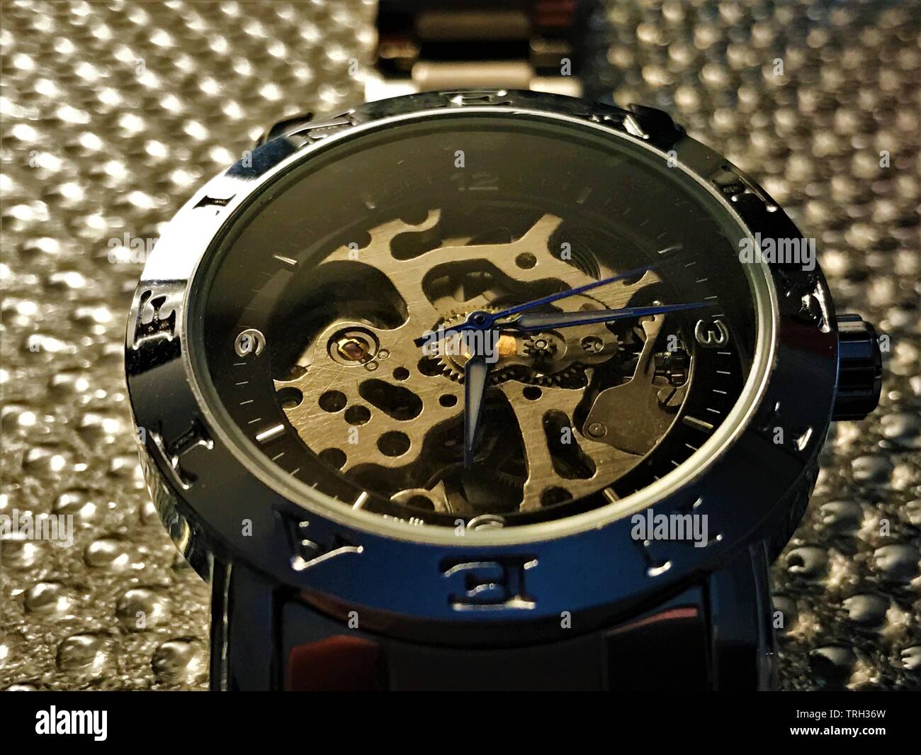 close-up photo of a cheap mechanical watch Stock Photo - Alamy