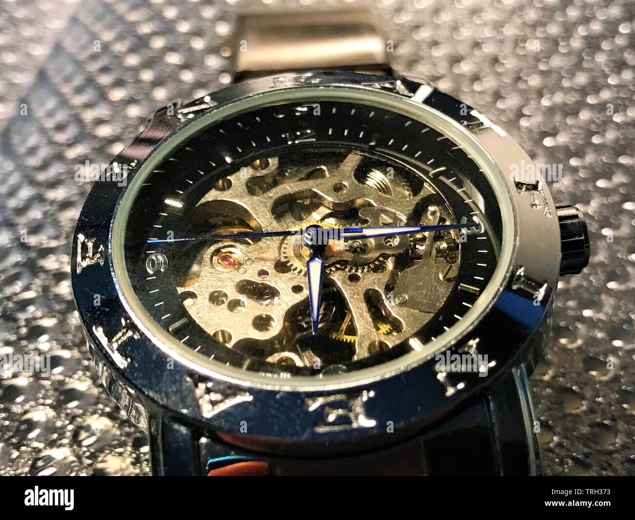 close-up photo of a cheap mechanical watch Stock Photo - Alamy