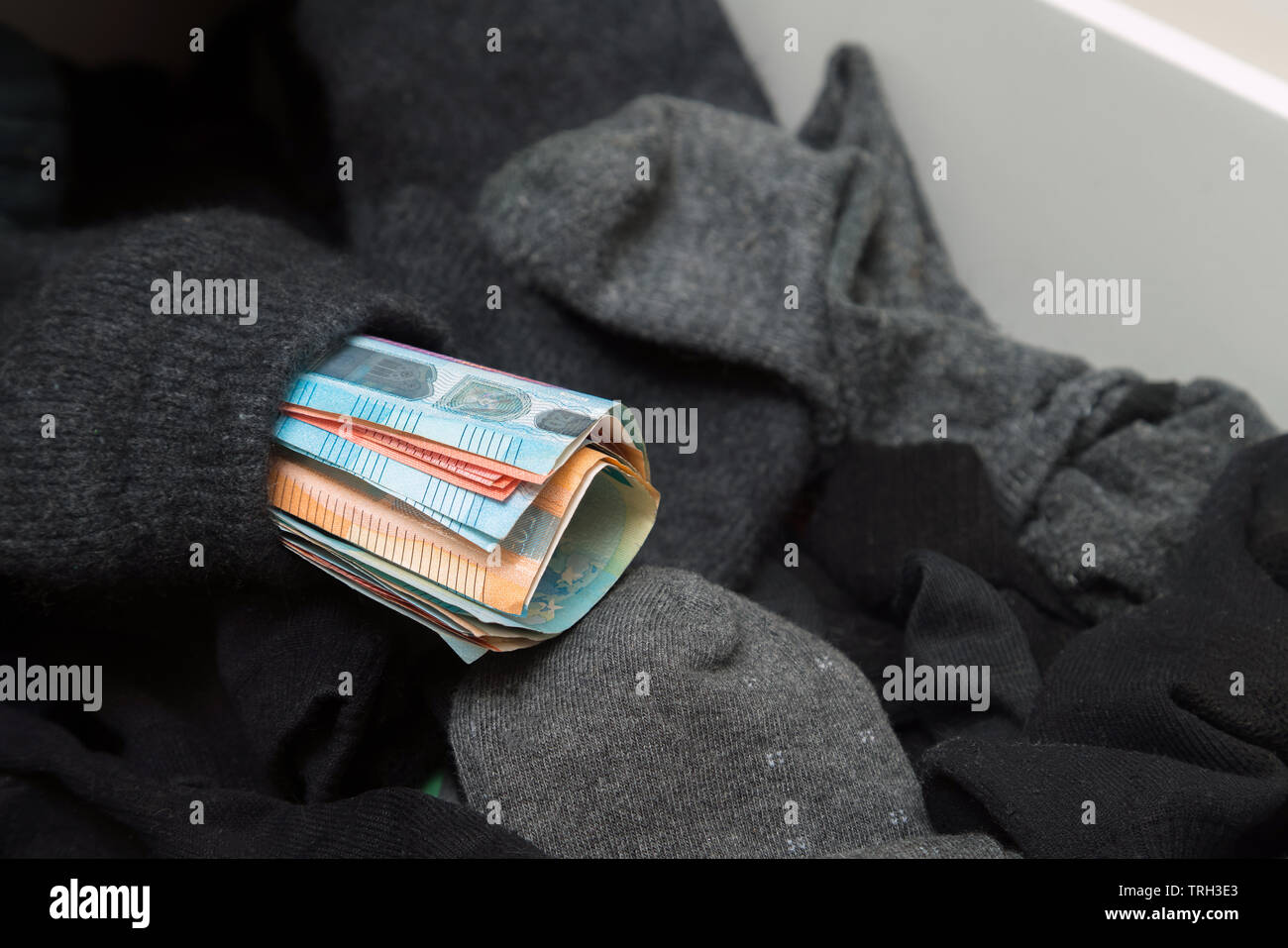 Money in sock hi-res stock photography and images - Alamy