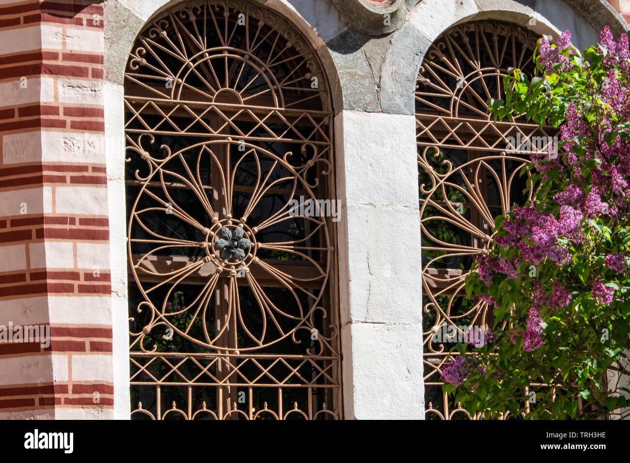 Close up view of architecture exterior detail - antique wrought iron ...