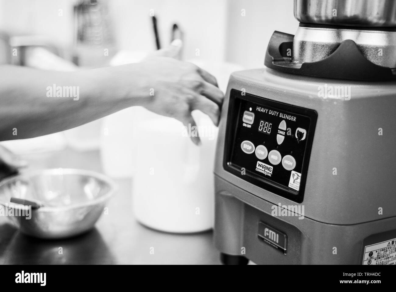 making gelato ice cream with modern professional equipment preparation ...