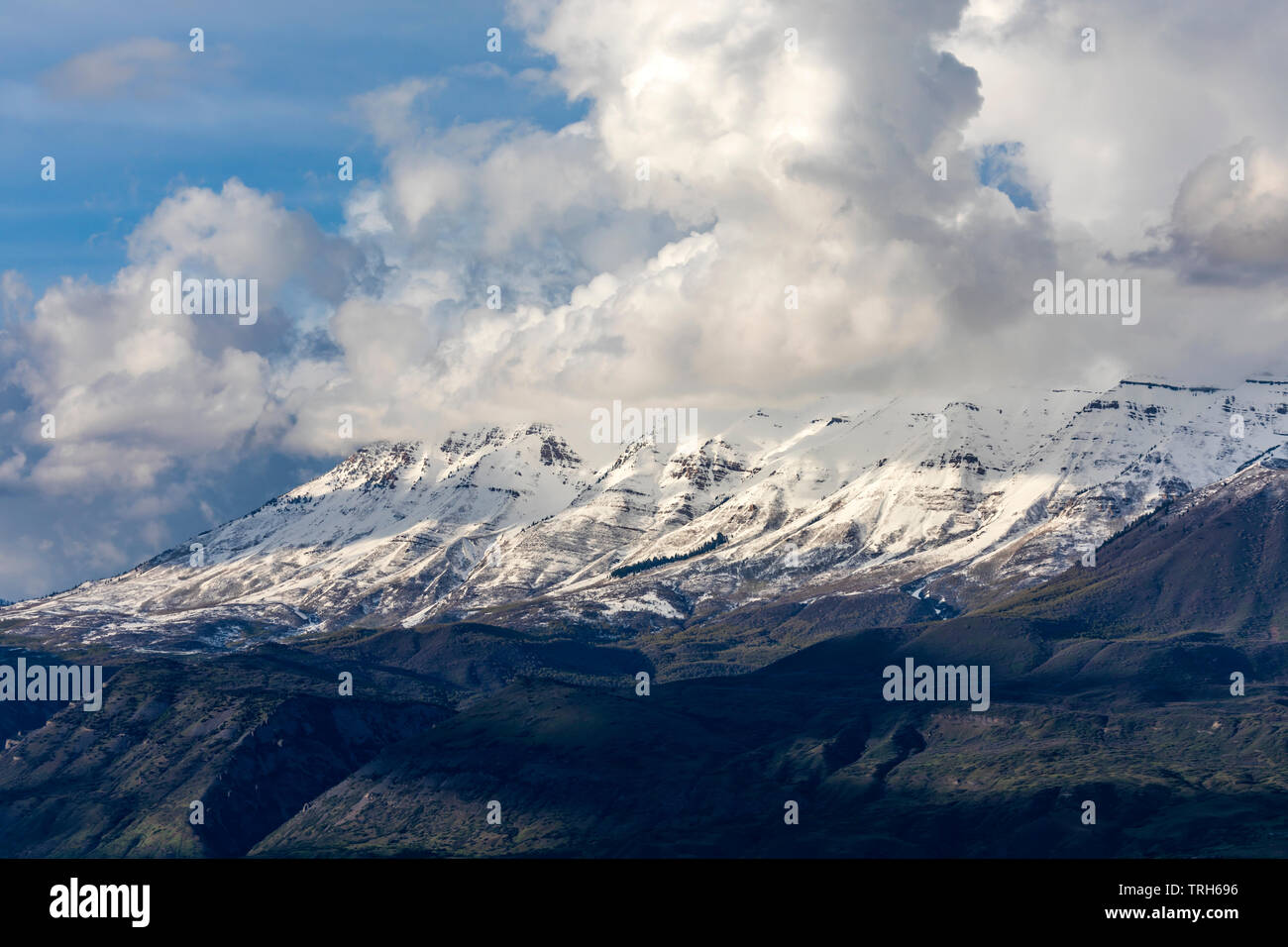 This is a view of cloud-enshrouded Mountain Timpanogos in the late ...