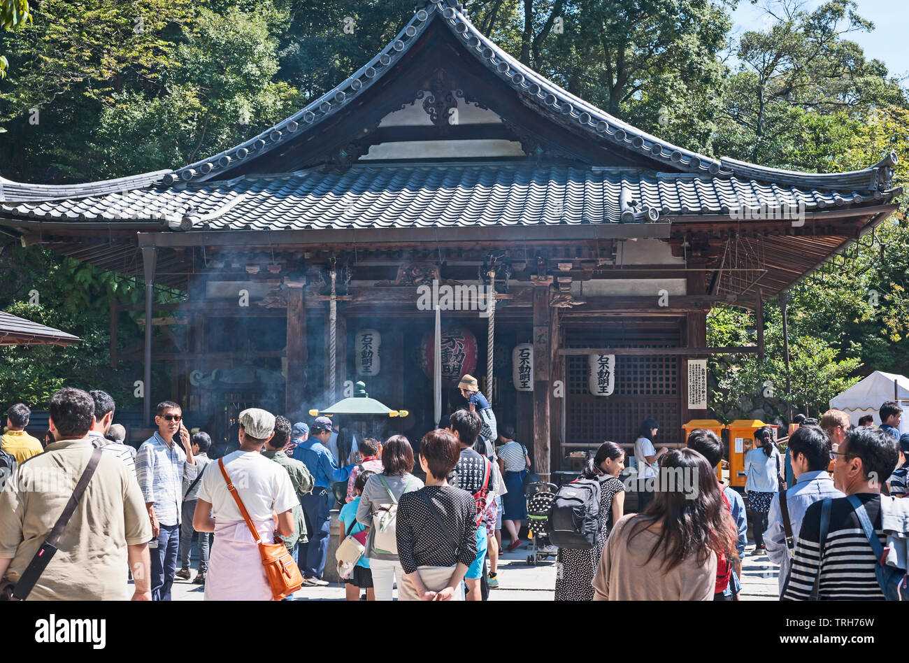 Small wooden temple inside the grounds of the Rokuon-ji temple complex ...