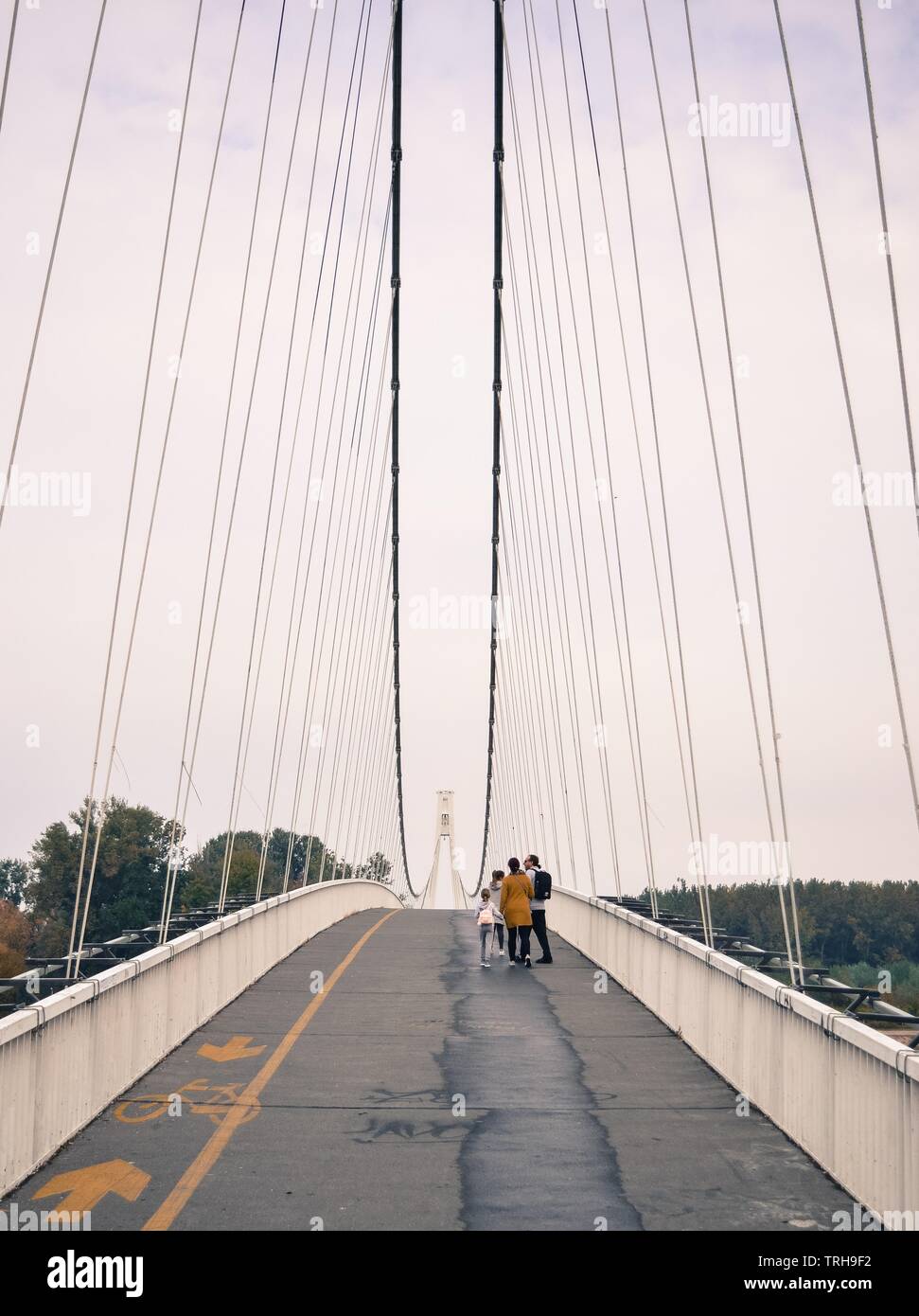 People walking over pedestrian bridge in Osijek, Croatia Stock Photo ...