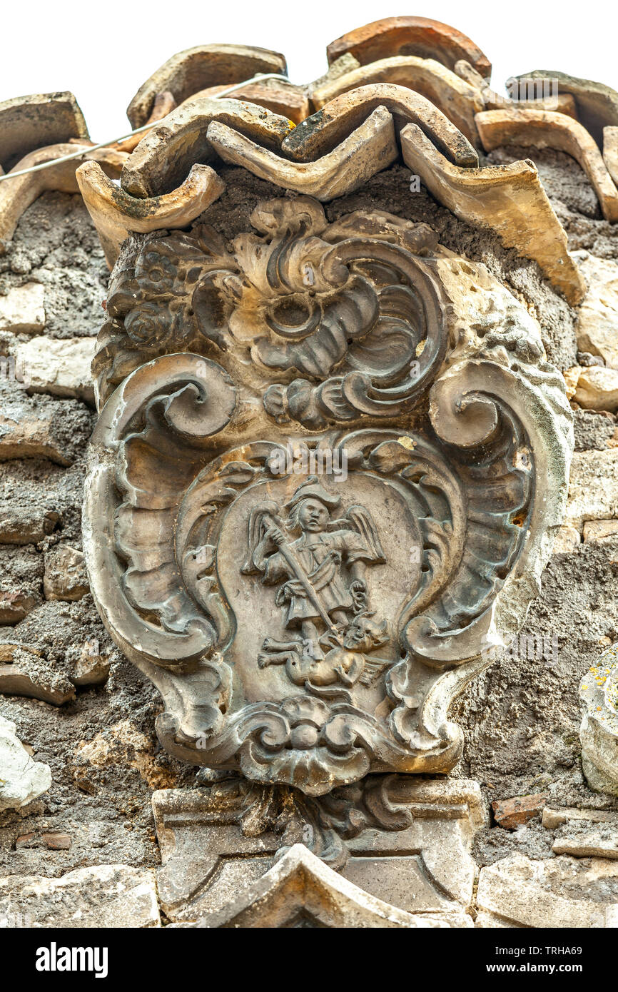 bas-relief, keystone with the archangel Michael. Bisegna, Abruzzo Stock ...