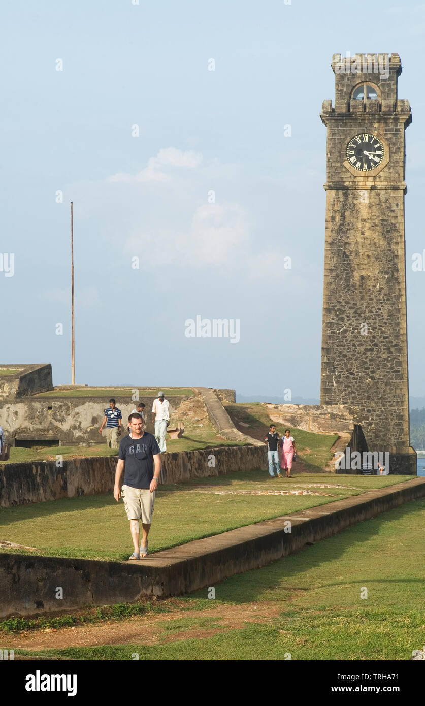 A man of European origin walks along the Dutch built ramparts ...