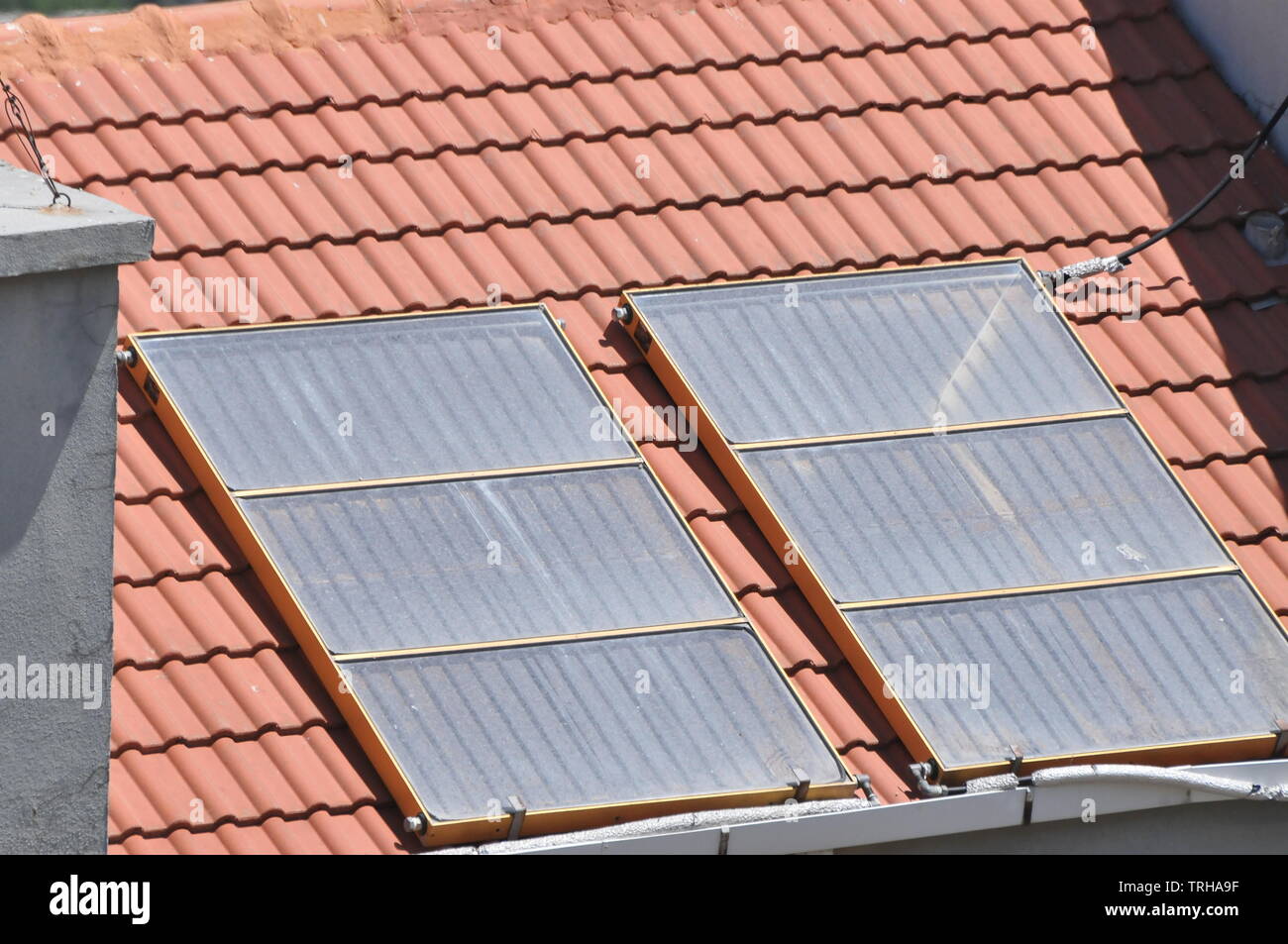 Solar water heater collectors on a roof. Photographed in Haifa, Israel ...