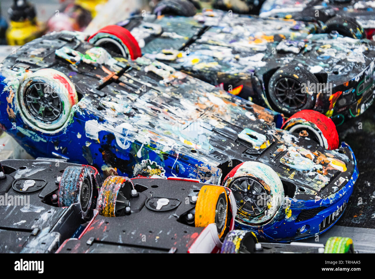 Paint splattered radio controlled cars being used to produce artwork ...