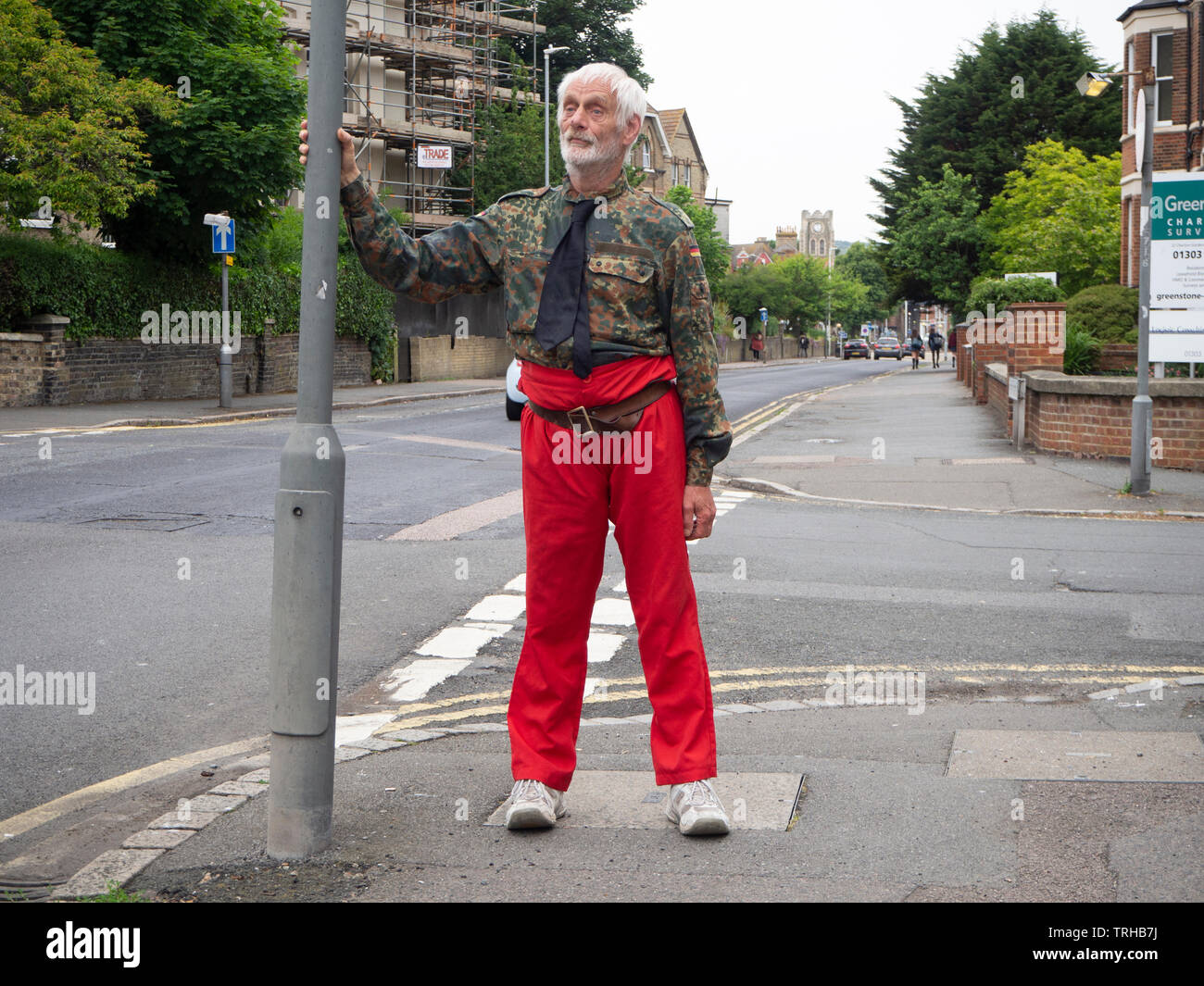 elderly man in red trousers Stock Photo - Alamy