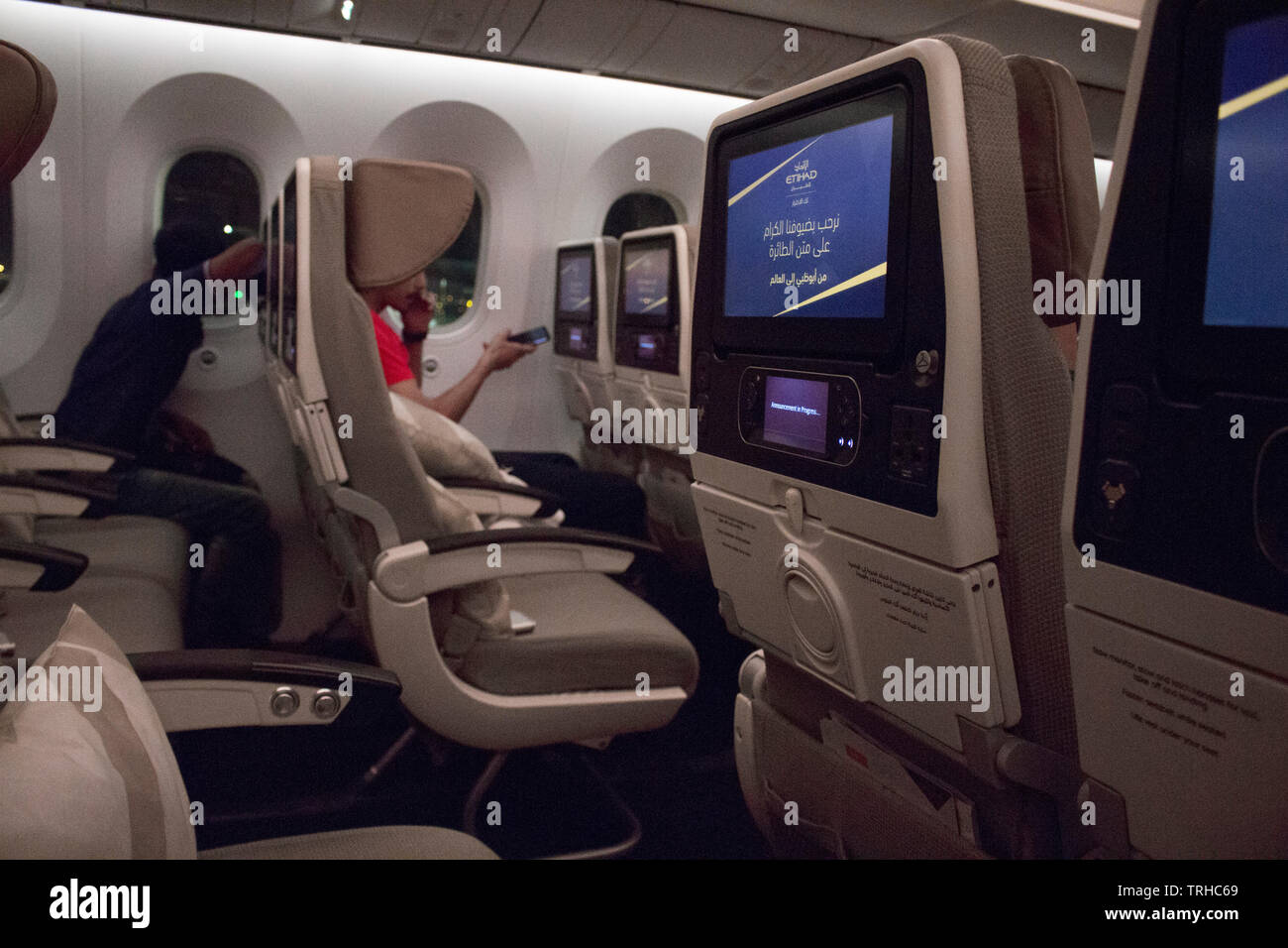 Etihad Airways seat screen and welcoming statement inside the air plane ...