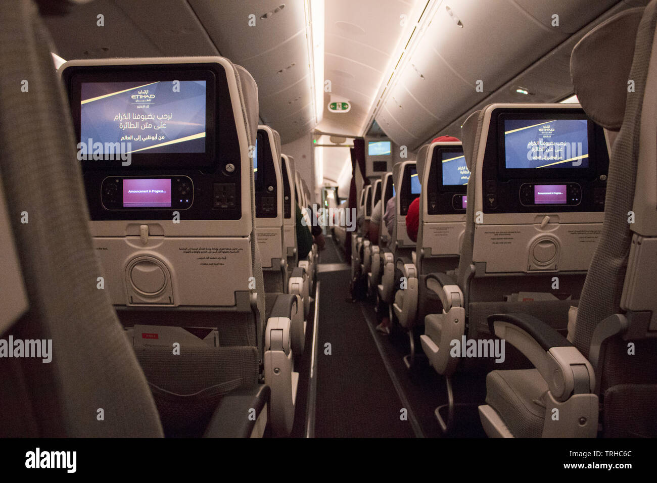 Etihad Airways seat screen and welcoming statement inside the air plane ...