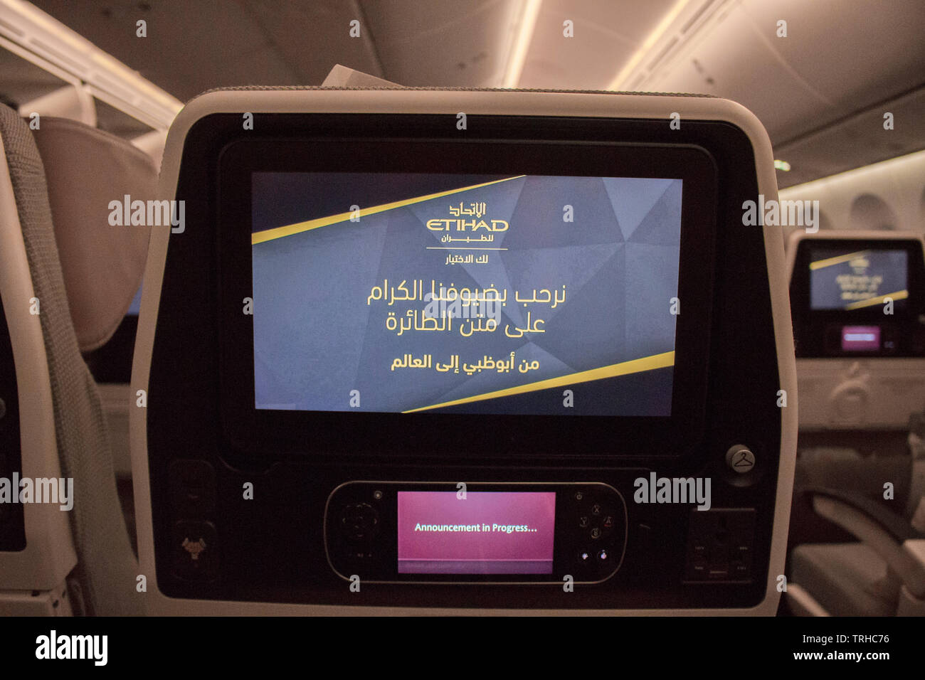 Etihad Airways seat screen and welcoming statement inside the air plane ...