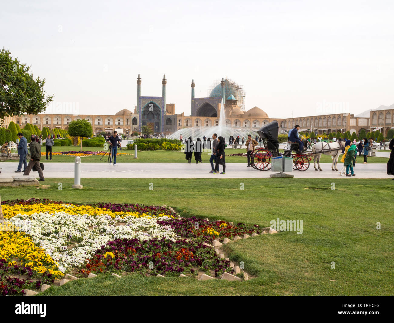 Flowers in bloom at Maydan-e Imam Square, also known as Naqsh-e Jahan ...