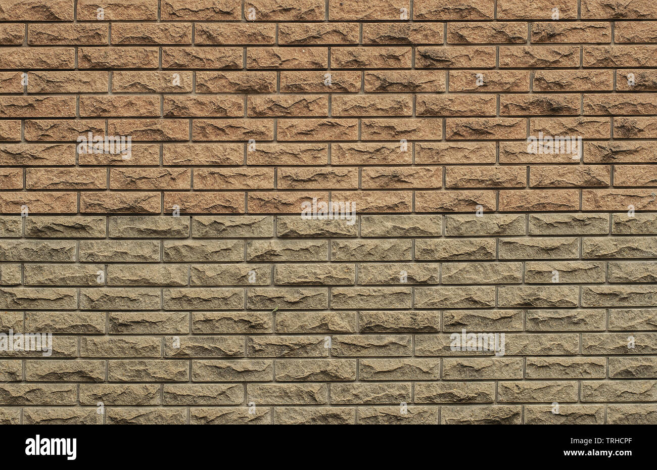 Two-color brick wall texture background Stock Photo - Alamy