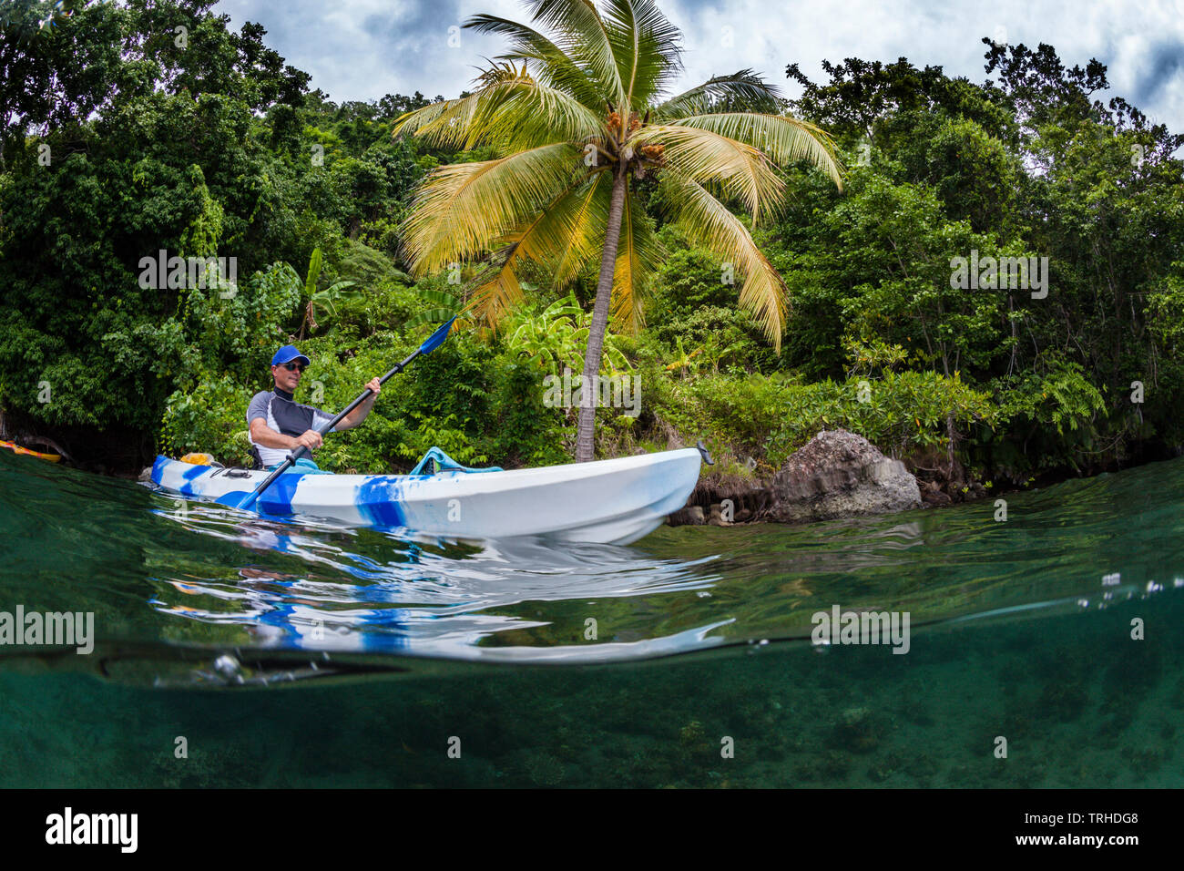 Kayaking in Fjords near Tufi, Cape Nelson, Papua New Guinea Stock Photo ...