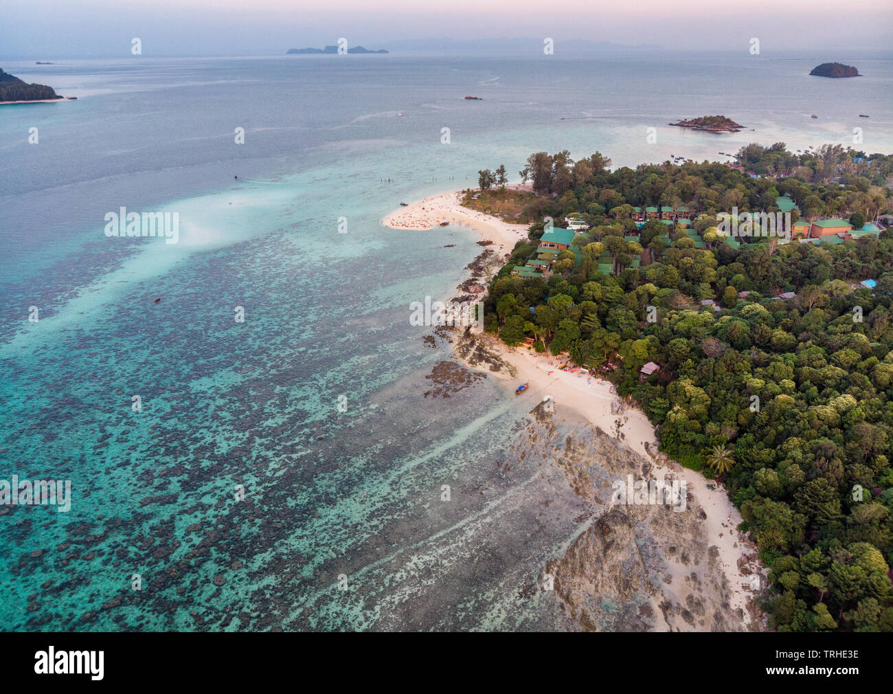 Aerial view of beautiful tropical sea with coral reef at sunset. Lipe ...