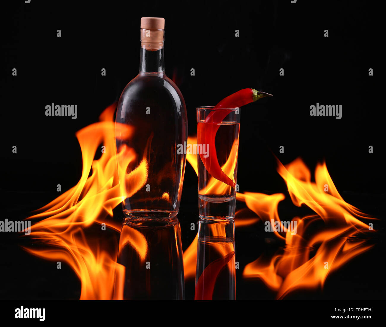 Stack of tequila on fire Stock Photo - Alamy
