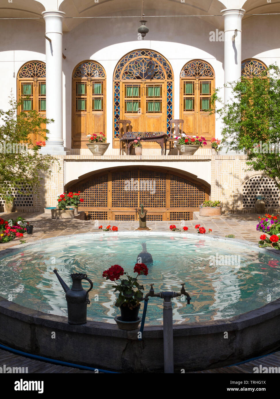 The courtyard of Morshedi House, an old merchant house converted into a ...