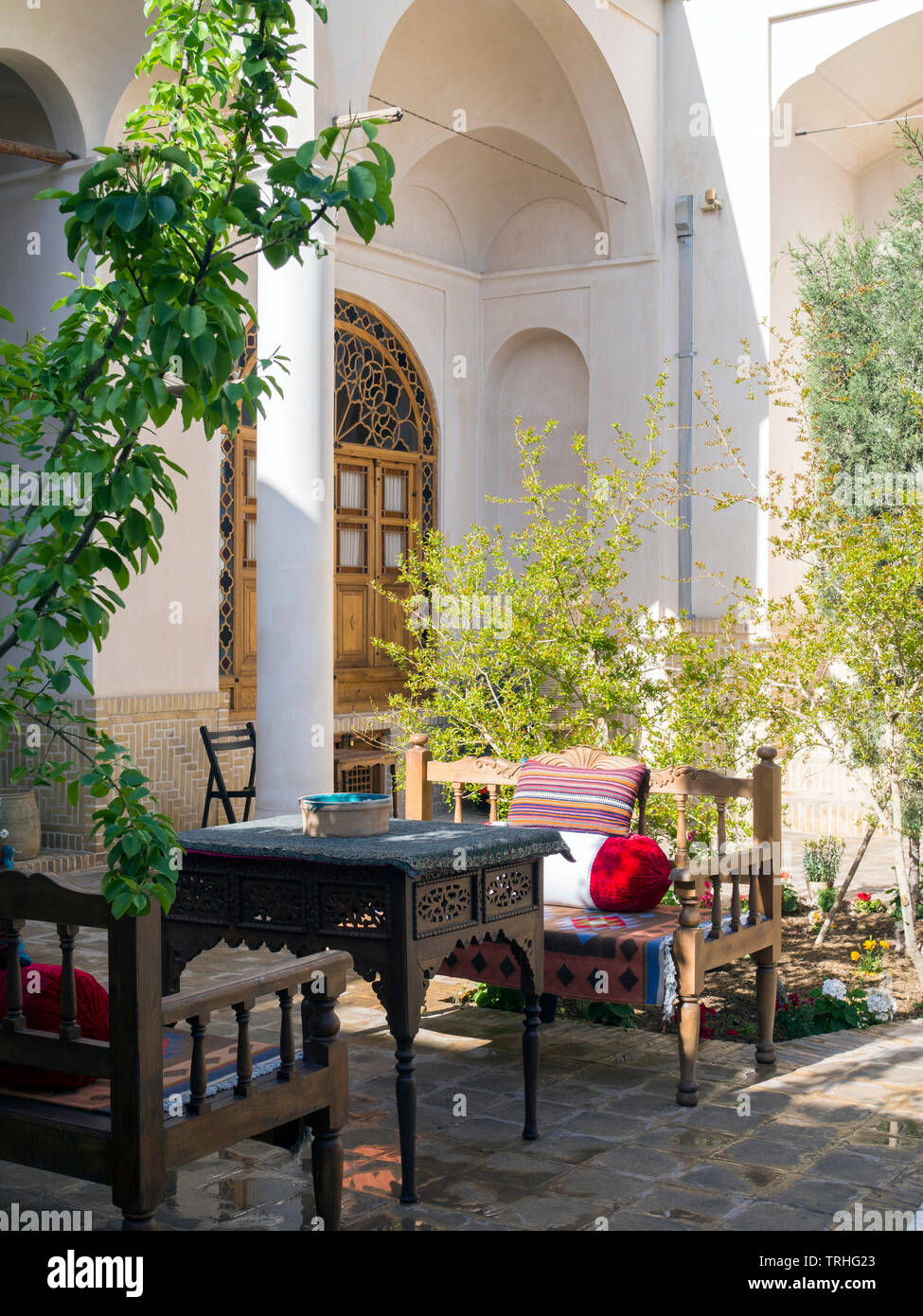 The courtyard of Morshedi House, an old merchant house converted into a ...