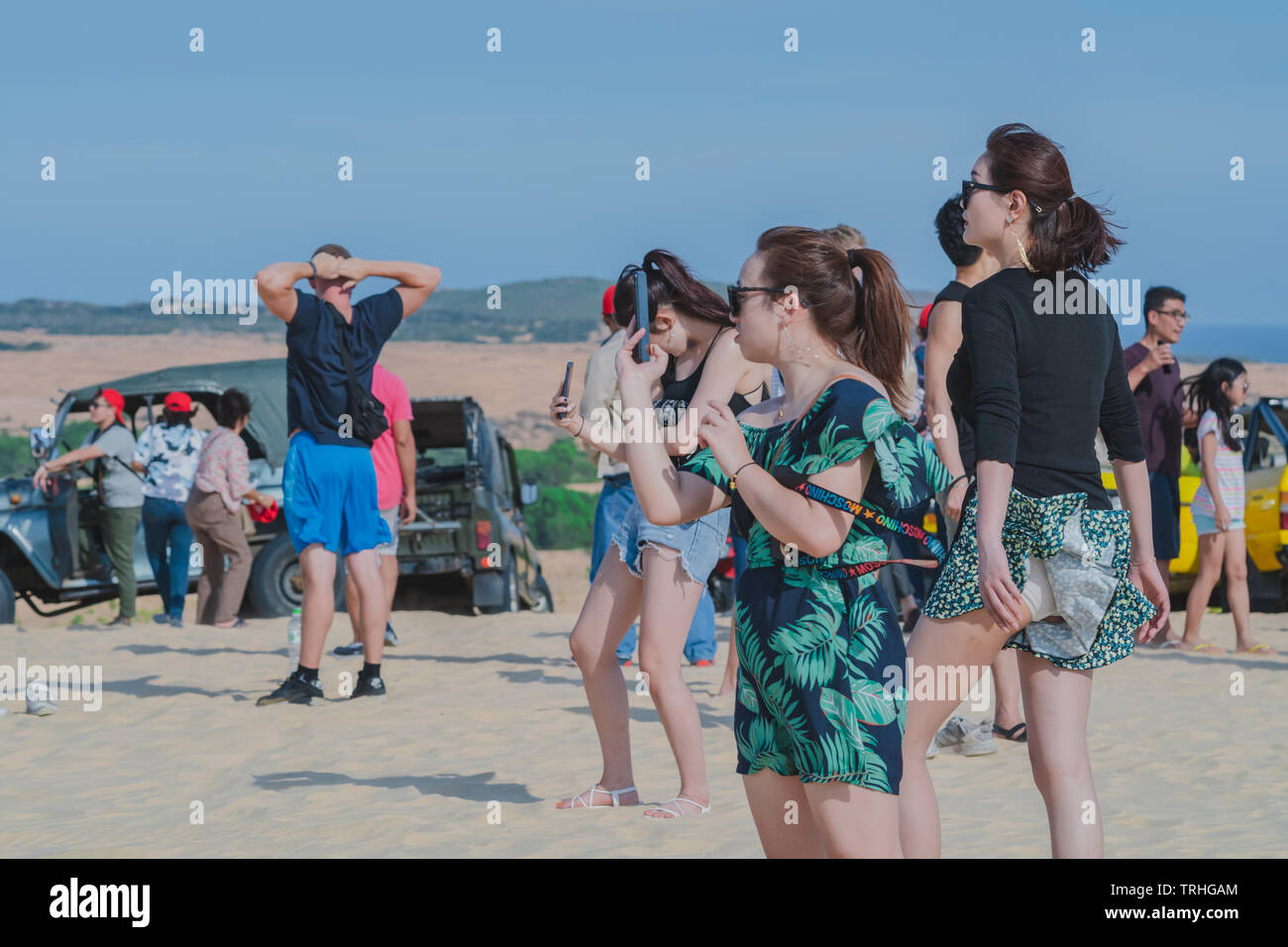 MUI NE, VIETNAM - APRIL 25 : Unidentified tourists relax and take ...