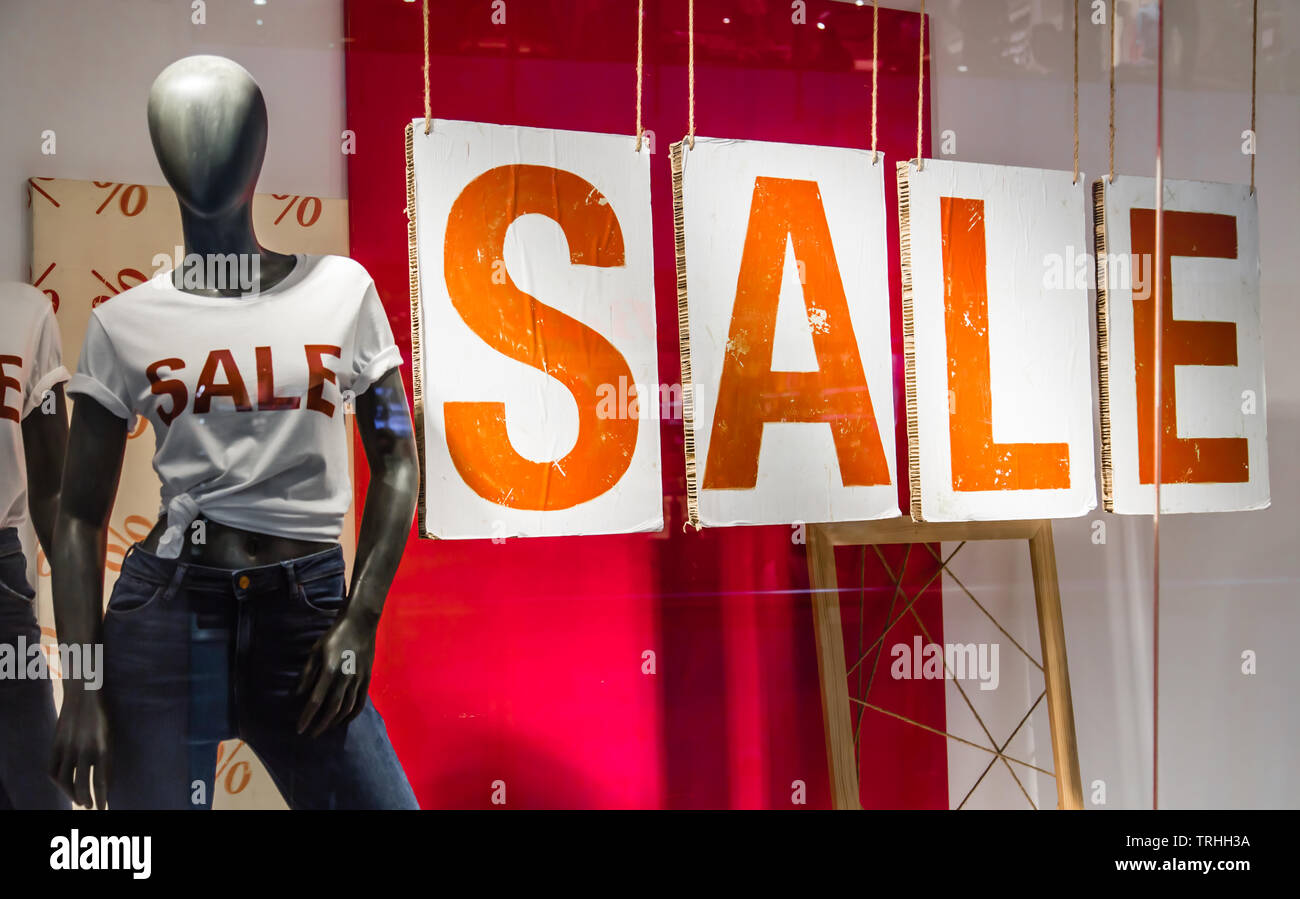 fashion figure display in big sale shop Stock Photo - Alamy