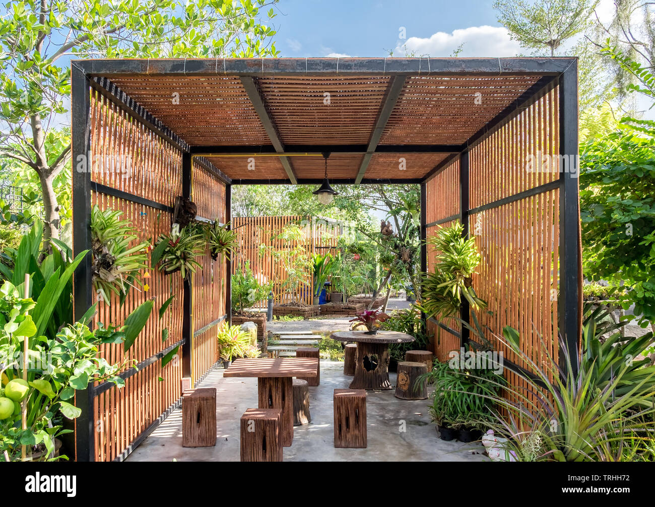 Architecture building wooden exterior in shady garden Stock Photo - Alamy