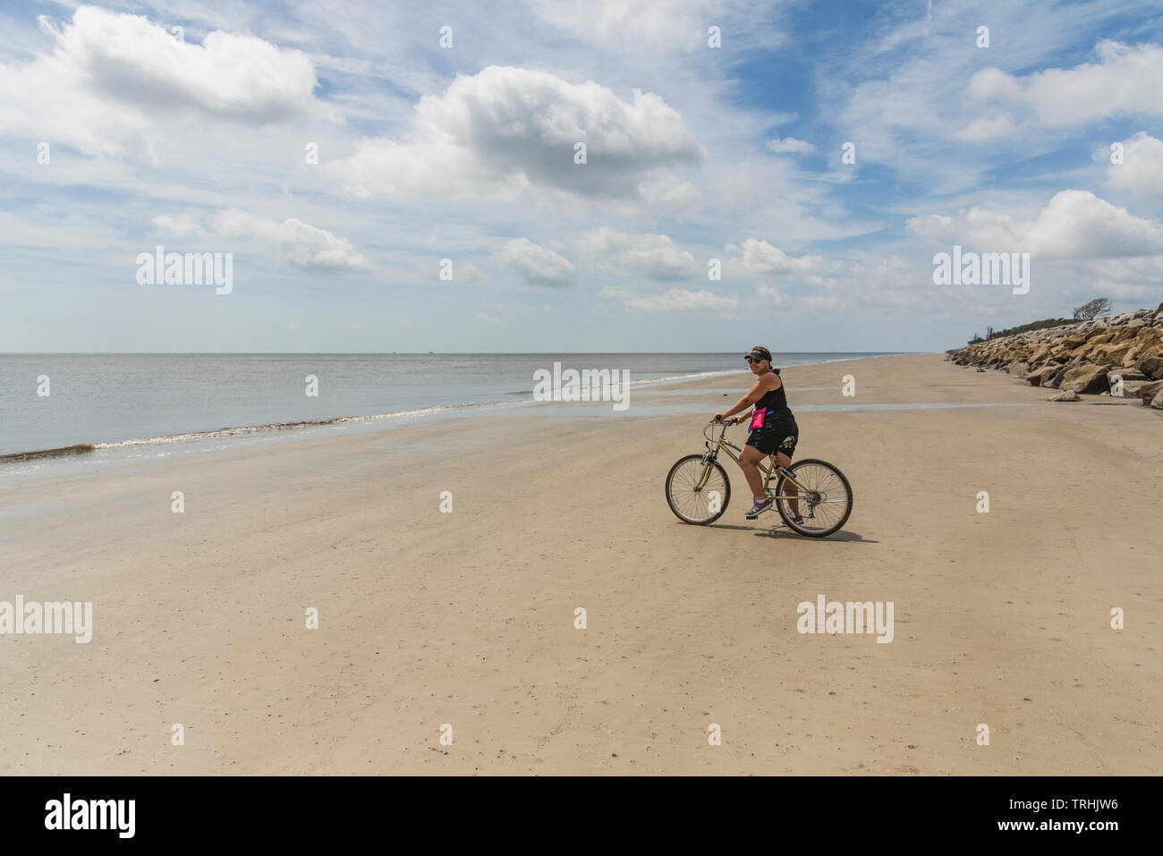 Woman bicycle island hi-res stock photography and images - Alamy