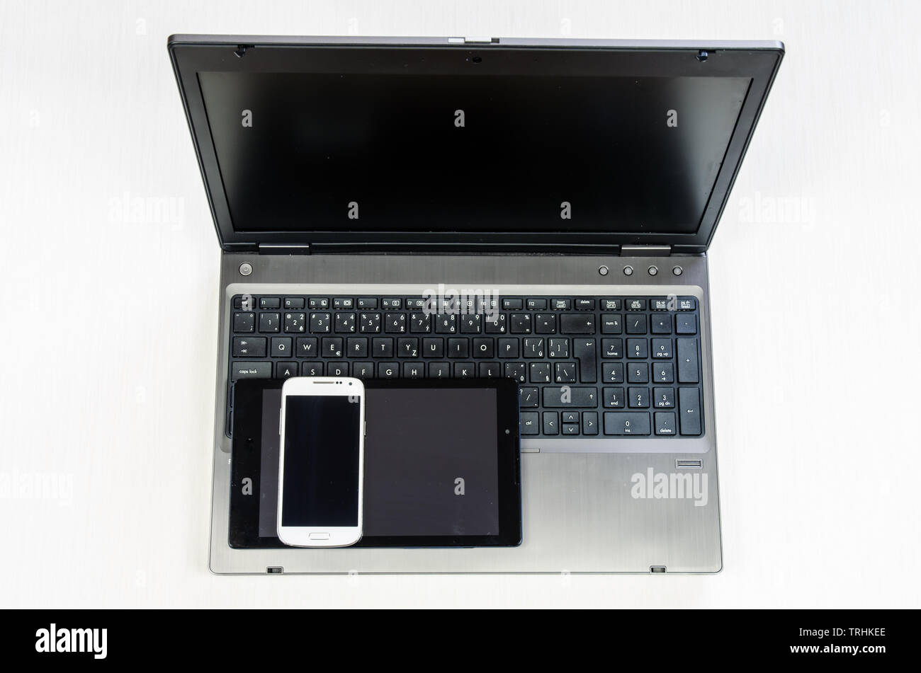 set of notebook, tablet and smartphone Stock Photo - Alamy