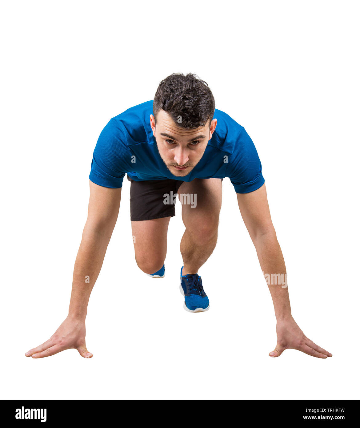 Determined caucasian man runner standing in running position looking ...