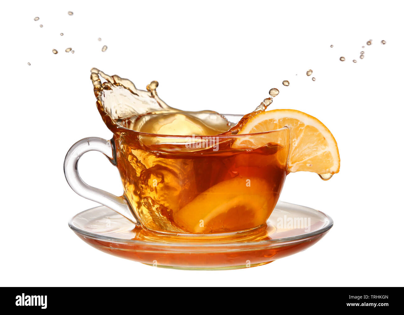 lemon tea with a splash on a white background Stock Photo - Alamy