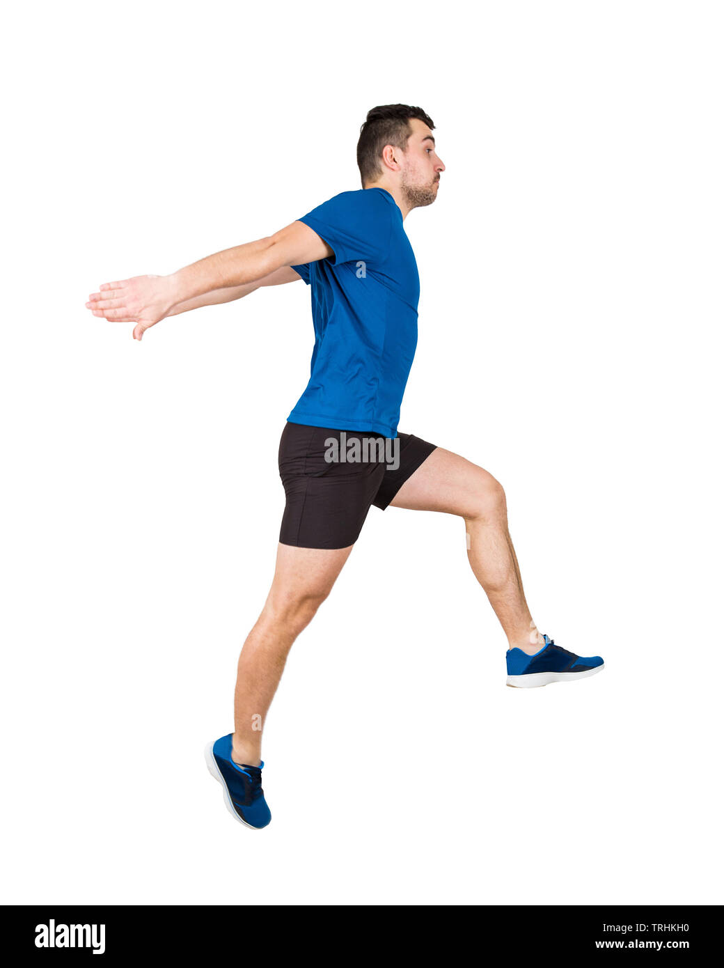 Side vie full length of determined caucasian man athlete jumping over ...