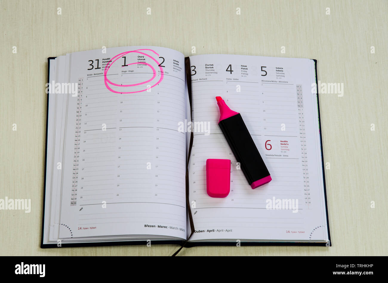 open diary with marked date and red marker Stock Photo - Alamy