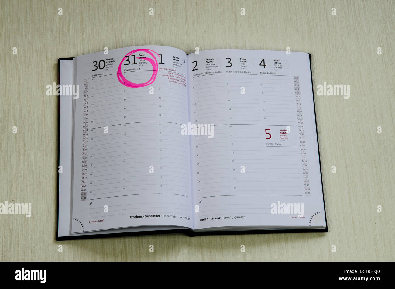 open diary with date marked red Stock Photo - Alamy